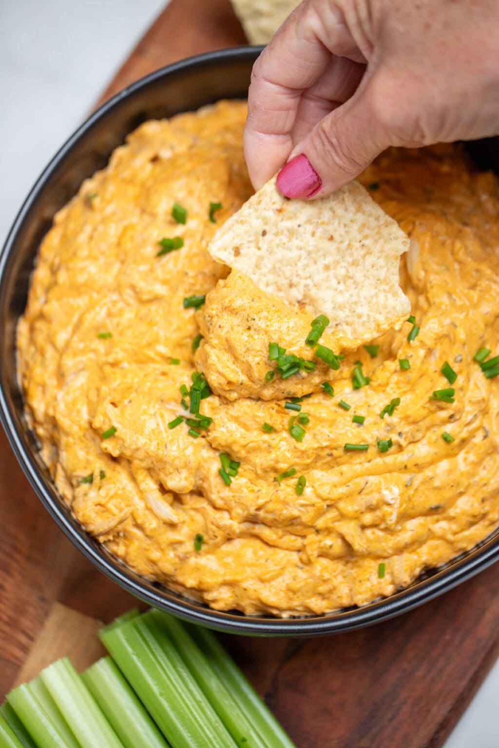 Slow Cooker Buffalo Chicken Dip • Dishing Delish