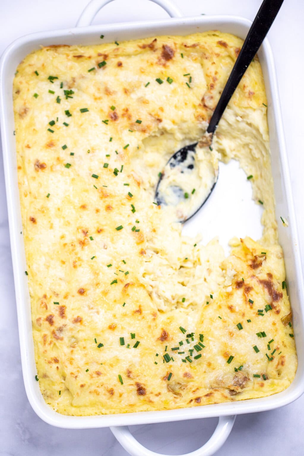 Twice Baked Mashed Potatoes • Dishing Delish