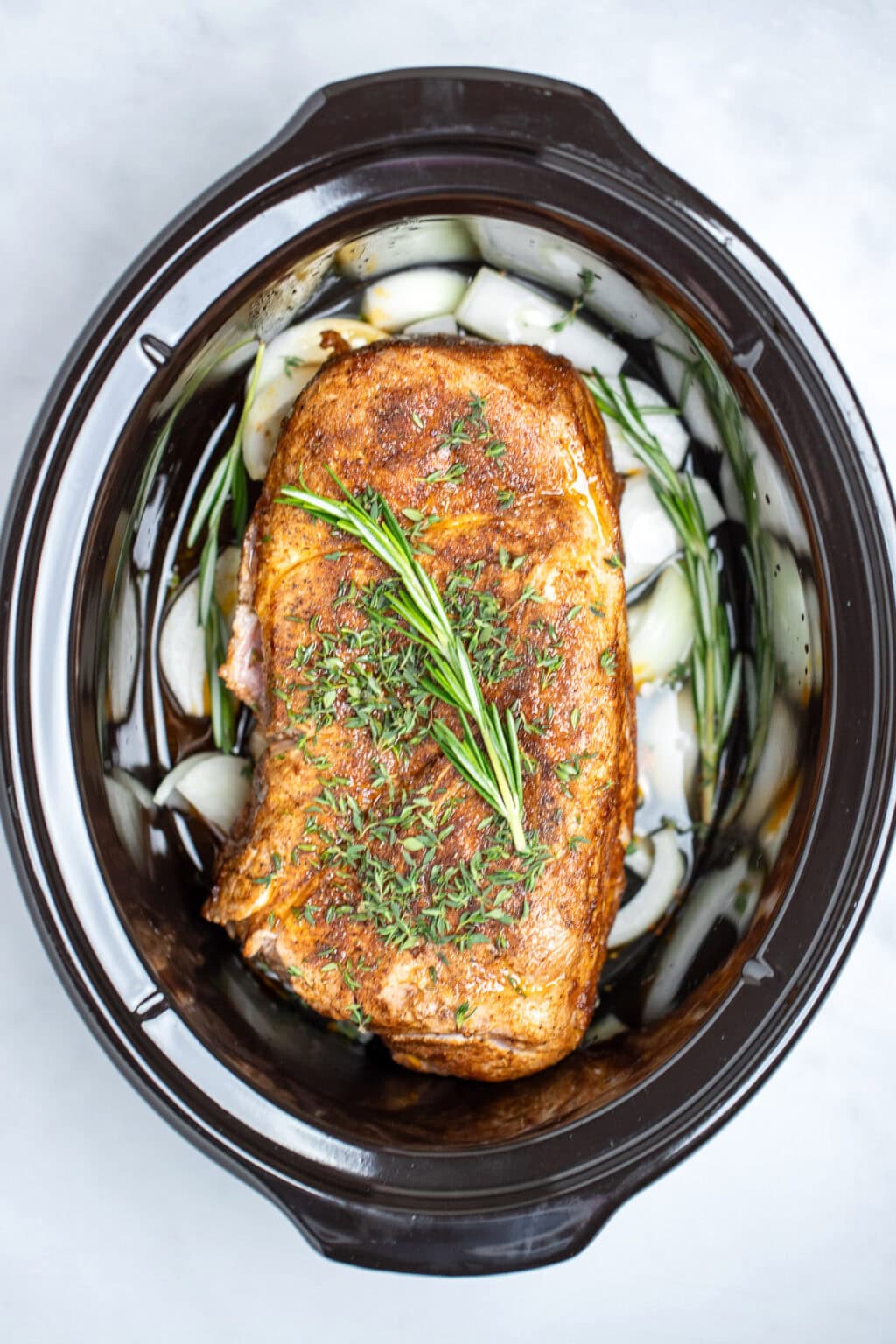 Slow Cooker Pork Roast • Dishing Delish