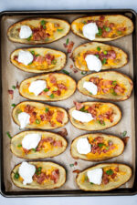 Loaded Potato Skins • Dishing Delish