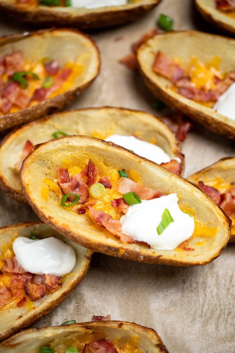 Loaded Potato Skins • Dishing Delish