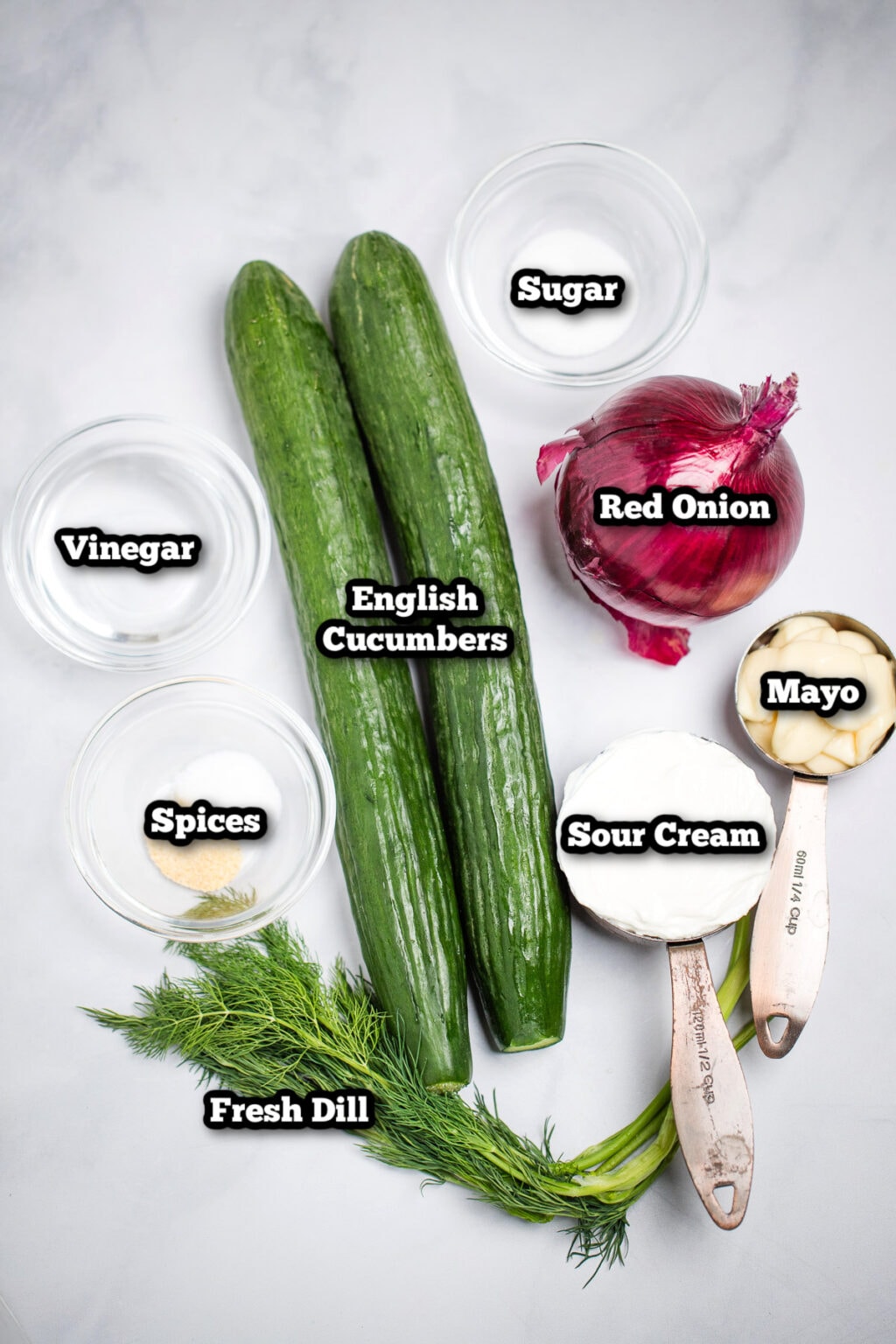 Creamy Cucumber Salad • Dishing Delish