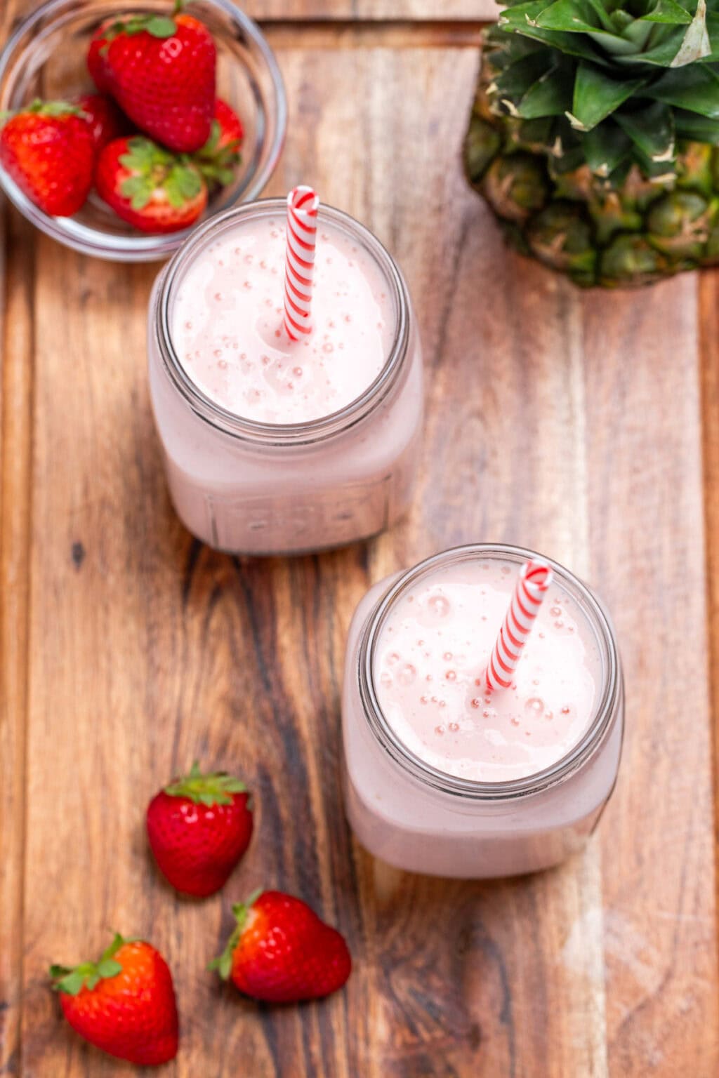 Strawberry Pineapple Smoothie • Dishing Delish