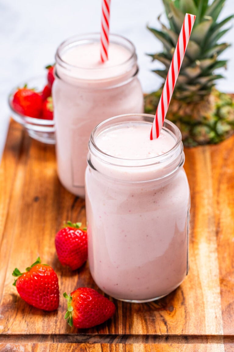 Strawberry Pineapple Smoothie • Dishing Delish